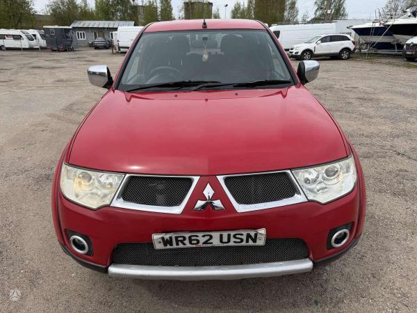 Red Mitsubishi l-200 2012 in Silute, with an engine capacity of 2.48 L and mileage of 107 thousand km for 5750 €, photo 8 on AUTOMOTO.COM.LV
