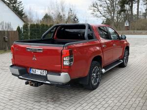 Red Mitsubishi l-200 2021 in Liepaja, with an engine capacity of 2.20 L and mileage of 117 thousand km for 27000 €, photo 5 on AUTOMOTO.COM.LV