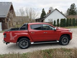 Red Mitsubishi l-200 2021 in Liepaja, with an engine capacity of 2.20 L and mileage of 117 thousand km for 27000 €, photo 6 on AUTOMOTO.COM.LV