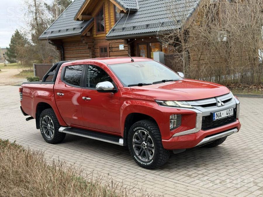 Red Mitsubishi l-200 2021 in Liepaja, with an engine capacity of 2.20 L and mileage of 117 thousand km for 27000 €, photo 7 on AUTOMOTO.COM.LV