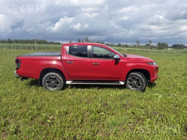 Sarkans Mitsubishi l-200 2022 Rīga, ar dzinēja tilpumu 2.30 L un nobraukumu 80 tūkst. km par 32900 €, foto 2 vietnē AUTOMOTO.COM.LV