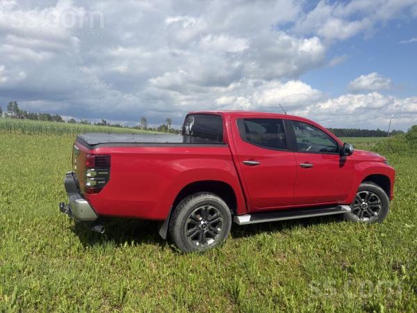 Sarkans Mitsubishi l-200 2022 Rīga, ar dzinēja tilpumu 2.30 L un nobraukumu 80 tūkst. km par 32900 €, foto 3 vietnē AUTOMOTO.COM.LV
