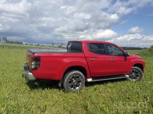 Red Mitsubishi l-200 2022 in Riga, with an engine capacity of 2.30 L and mileage of 80 thousand km for 29900 €, photo 4 on AUTOMOTO.COM.LV