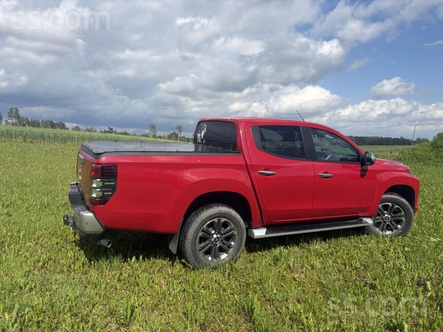 Red Mitsubishi l-200 2022 in Riga, with an engine capacity of 2.30 L and mileage of 80 thousand km for 29900 €, photo 4 on AUTOMOTO.COM.LV