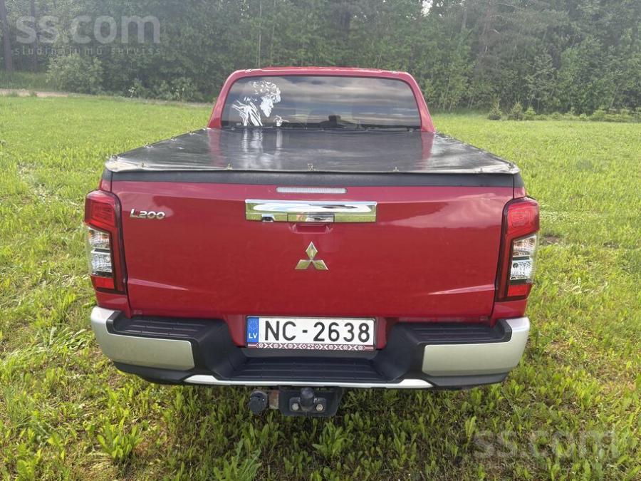 Red Mitsubishi l-200 2022 in Riga, with an engine capacity of 2.30 L and mileage of 80 thousand km for 29900 €, photo 18 on AUTOMOTO.COM.LV