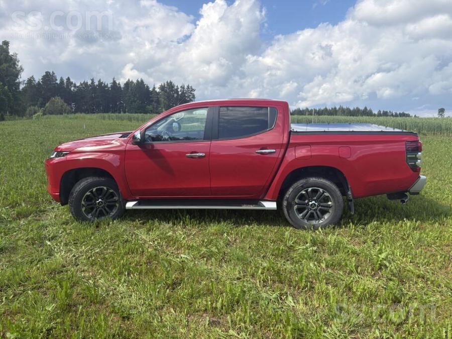 Red Mitsubishi l-200 2022 in Riga, with an engine capacity of 2.30 L and mileage of 80 thousand km for 29900 €, photo 21 on AUTOMOTO.COM.LV