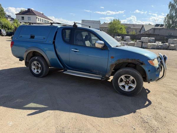 Violet Mitsubishi l-200 2006 in Kaunas, with an engine capacity of 0.00 L and mileage of 380 thousand km for 3300 €, photo 4 on AUTOMOTO.COM.LV