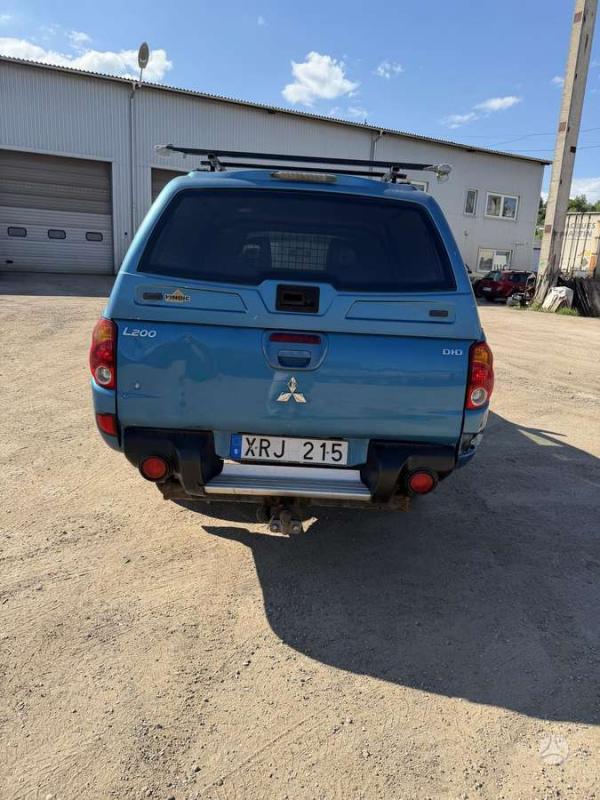Violet Mitsubishi l-200 2006 in Kaunas, with an engine capacity of 0.00 L and mileage of 380 thousand km for 3300 €, photo 6 on AUTOMOTO.COM.LV