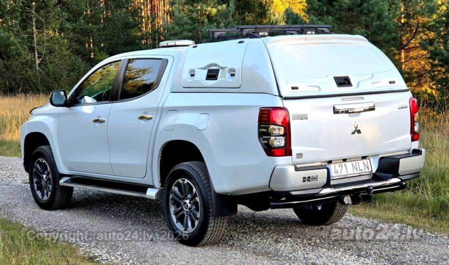 White Mitsubishi l-200 2021 in Tallinn, with an engine capacity of 2.30 L and mileage of 184 thousand km for 22900 €, photo 4 on AUTOMOTO.COM.LV