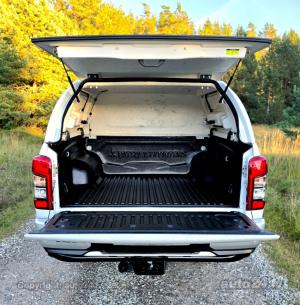 White Mitsubishi l-200 2021 in Tallinn, with an engine capacity of 2.30 L and mileage of 184 thousand km for 22900 €, photo 13 on AUTOMOTO.COM.LV
