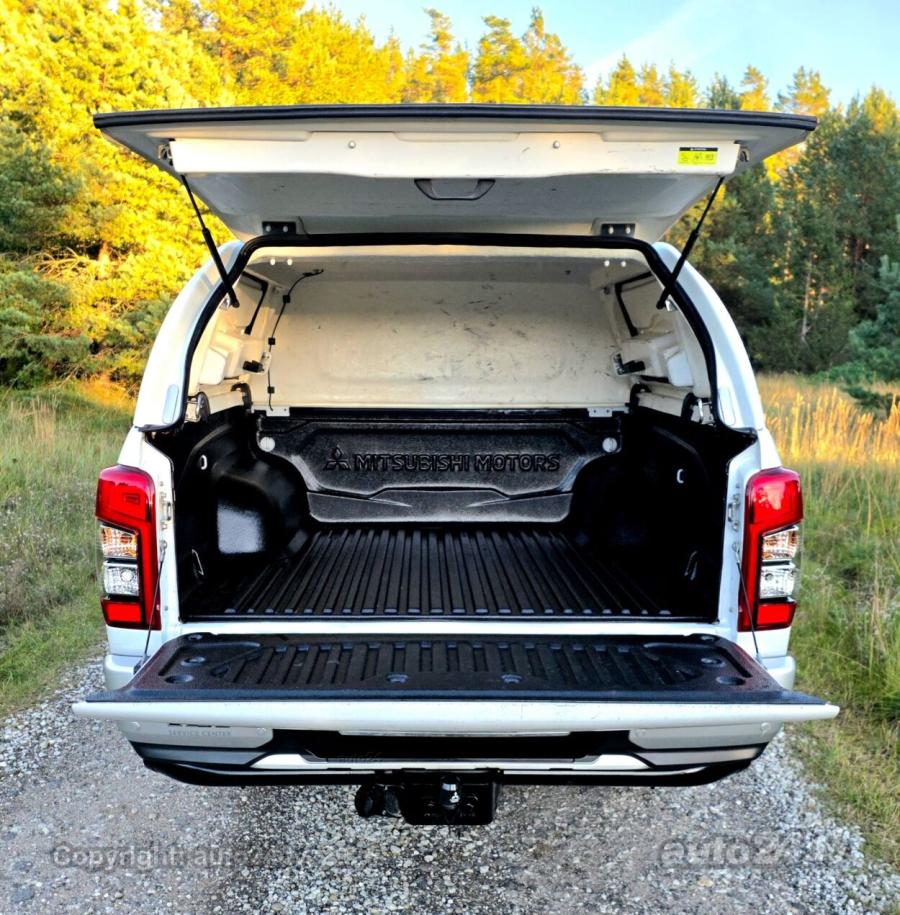 White Mitsubishi l-200 2021 in Tallinn, with an engine capacity of 2.30 L and mileage of 184 thousand km for 22900 €, photo 13 on AUTOMOTO.COM.LV