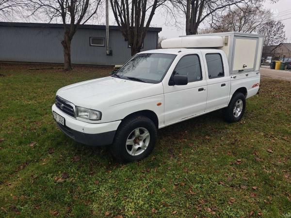 White Mitsubishi l-200 2003 in Kretinga, with an engine capacity of 2.48 L and mileage of 207 thousand km for 4999 €, photo 1 on AUTOMOTO.COM.LV