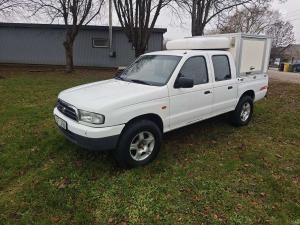 White Mitsubishi l-200 2003 in Kretinga, with an engine capacity of 2.48 L and mileage of 207 thousand km for 4999 €, photo  on AUTOMOTO.COM.LV