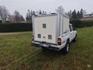 White Mitsubishi l-200 2003 in Kretinga, with an engine capacity of 2.48 L and mileage of 207 thousand km for 4999 €, photo 7 on AUTOMOTO.COM.LV