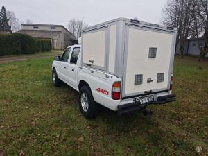 White Mitsubishi l-200 2003 in Kretinga, with an engine capacity of 2.48 L and mileage of 207 thousand km for 4999 €, photo 8 on AUTOMOTO.COM.LV