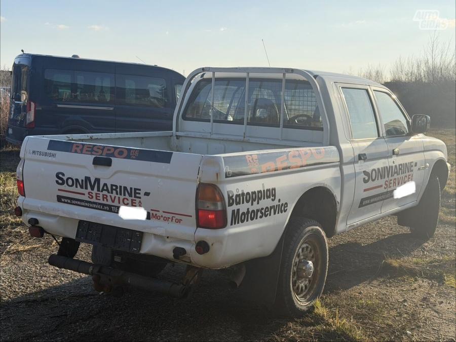 White Mitsubishi l-200 2005 in Kaunas, with an engine capacity of 2.50 L and mileage of 180 thousand km for 3900 €, photo 4 on AUTOMOTO.COM.LV