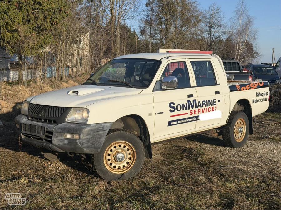 White Mitsubishi l-200 2005 in Kaunas, with an engine capacity of 2.50 L and mileage of 180 thousand km for 3900 €, photo 5 on AUTOMOTO.COM.LV
