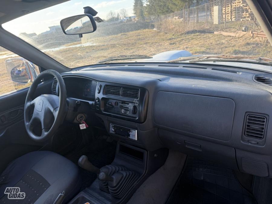 White Mitsubishi l-200 2005 in Kaunas, with an engine capacity of 2.50 L and mileage of 180 thousand km for 3900 €, photo 13 on AUTOMOTO.COM.LV
