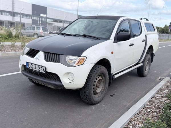 White Mitsubishi l-200 2008 in Vilnius, with an engine capacity of 2.48 L and mileage of 252 thousand km for 5500 €, photo 2 on AUTOMOTO.COM.LV