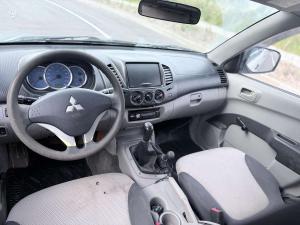 Balts Mitsubishi l-200 2008 Viļņa, ar dzinēja tilpumu 2.48 L un nobraukumu 252 tūkst. km par 5500 €, foto 8 vietnē AUTOMOTO.COM.LV