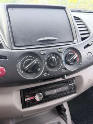 Balts Mitsubishi l-200 2008 Viļņa, ar dzinēja tilpumu 2.48 L un nobraukumu 252 tūkst. km par 5500 €, foto 12 vietnē AUTOMOTO.COM.LV