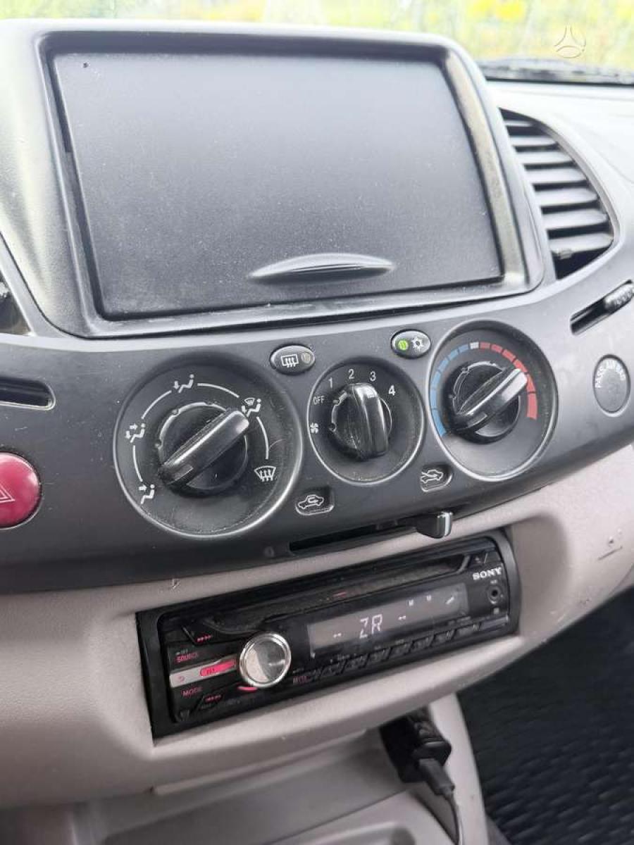 Balts Mitsubishi l-200 2008 Viļņa, ar dzinēja tilpumu 2.48 L un nobraukumu 252 tūkst. km par 5500 €, foto 12 vietnē AUTOMOTO.COM.LV