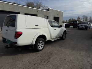 White Mitsubishi l-200 2010 in Pasvalys, with an engine capacity of 2.50 L and mileage of 250 thousand km for 4899 €, photo 5 on AUTOMOTO.COM.LV