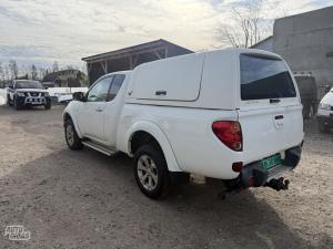 White Mitsubishi l-200 2010 in Pasvalys, with an engine capacity of 2.50 L and mileage of 250 thousand km for 4899 €, photo 6 on AUTOMOTO.COM.LV