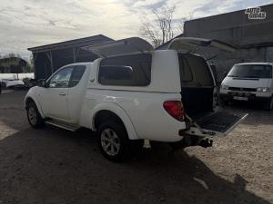 White Mitsubishi l-200 2010 in Pasvalys, with an engine capacity of 2.50 L and mileage of 250 thousand km for 4899 €, photo 9 on AUTOMOTO.COM.LV