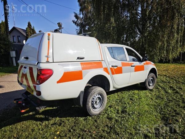 Mitsubishi l-200 2010 Jelgava vietnē Balts Mitsubishi l-200 2010 Jelgava, ar dzinēja tilpumu 2.50 L un nobraukumu 102 tūkst. km par 5850 €, foto 4 vietnē AUTOMOTO.COM.LV