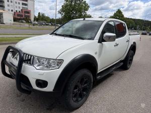 Balts Mitsubishi l-200 2012 Viļņa, ar dzinēja tilpumu 2.48 L un nobraukumu 272 tūkst. km par 5500 €, foto 12 vietnē AUTOMOTO.COM.LV