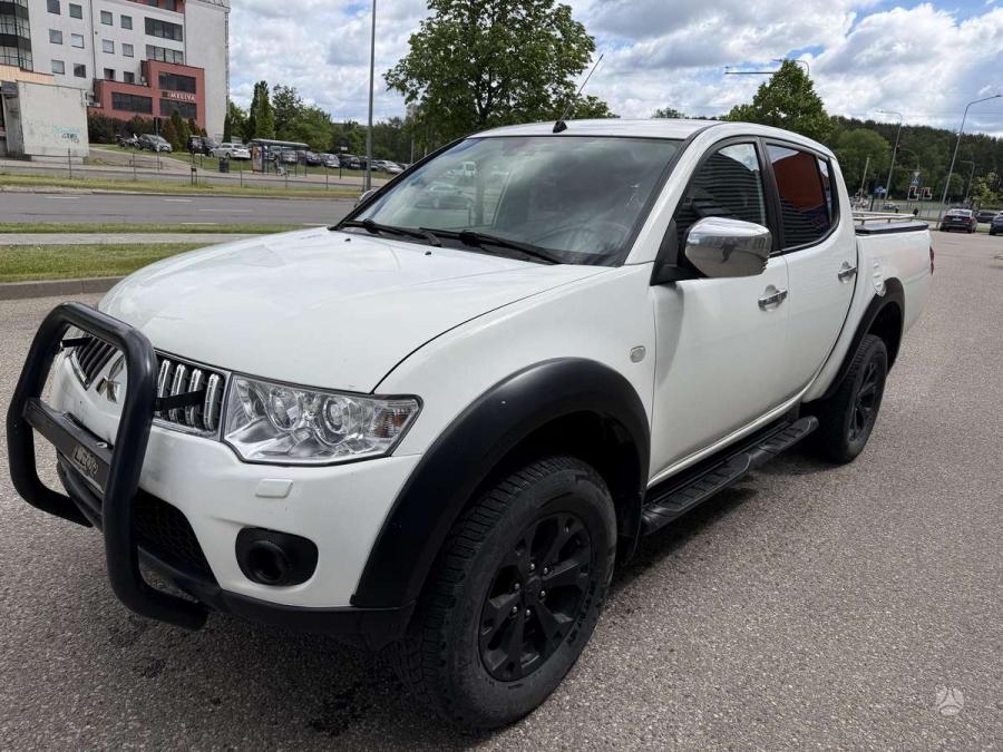 Balts Mitsubishi l-200 2012 Viļņa, ar dzinēja tilpumu 2.48 L un nobraukumu 272 tūkst. km par 5500 €, foto 12 vietnē AUTOMOTO.COM.LV