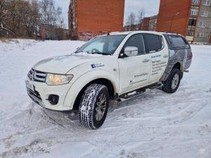 White Mitsubishi l-200 2015 in Jelgava, with an engine capacity of 2.44 L and mileage of 188 thousand km for 5950 €, photo 1 on AUTOMOTO.COM.LV