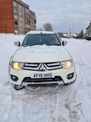 White Mitsubishi l-200 2015 in Jelgava, with an engine capacity of 2.44 L and mileage of 188 thousand km for 5950 €, photo 2 on AUTOMOTO.COM.LV