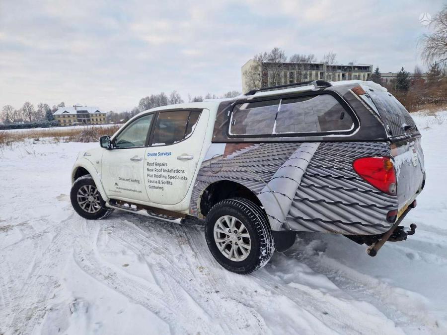 White Mitsubishi l-200 2015 in Jelgava, with an engine capacity of 2.44 L and mileage of 188 thousand km for 5950 €, photo 5 on AUTOMOTO.COM.LV