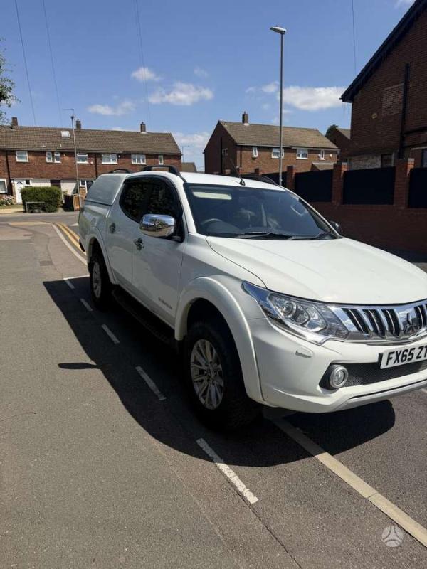 White Mitsubishi l-200 2015 in Jonava, with an engine capacity of 2.44 L and mileage of 158 thousand km for 8250 €, photo 1 on AUTOMOTO.COM.LV