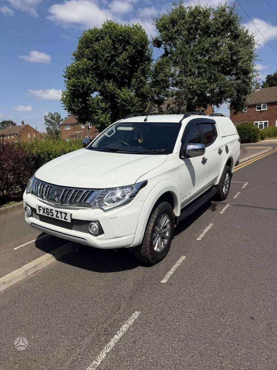 White Mitsubishi l-200 2015 in Jonava, with an engine capacity of 2.44 L and mileage of 158 thousand km for 8250 €, photo 3 on AUTOMOTO.COM.LV