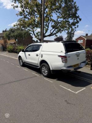 White Mitsubishi l-200 2015 in Jonava, with an engine capacity of 2.44 L and mileage of 158 thousand km for 8250 €, photo 4 on AUTOMOTO.COM.LV