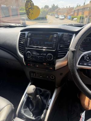 White Mitsubishi l-200 2015 in Jonava, with an engine capacity of 2.44 L and mileage of 158 thousand km for 8250 €, photo 8 on AUTOMOTO.COM.LV