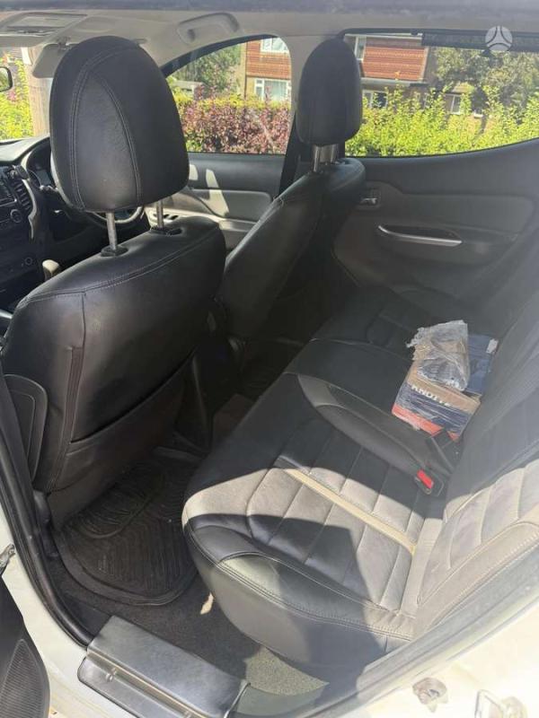White Mitsubishi l-200 2015 in Jonava, with an engine capacity of 2.44 L and mileage of 158 thousand km for 8250 €, photo 8 on AUTOMOTO.COM.LV