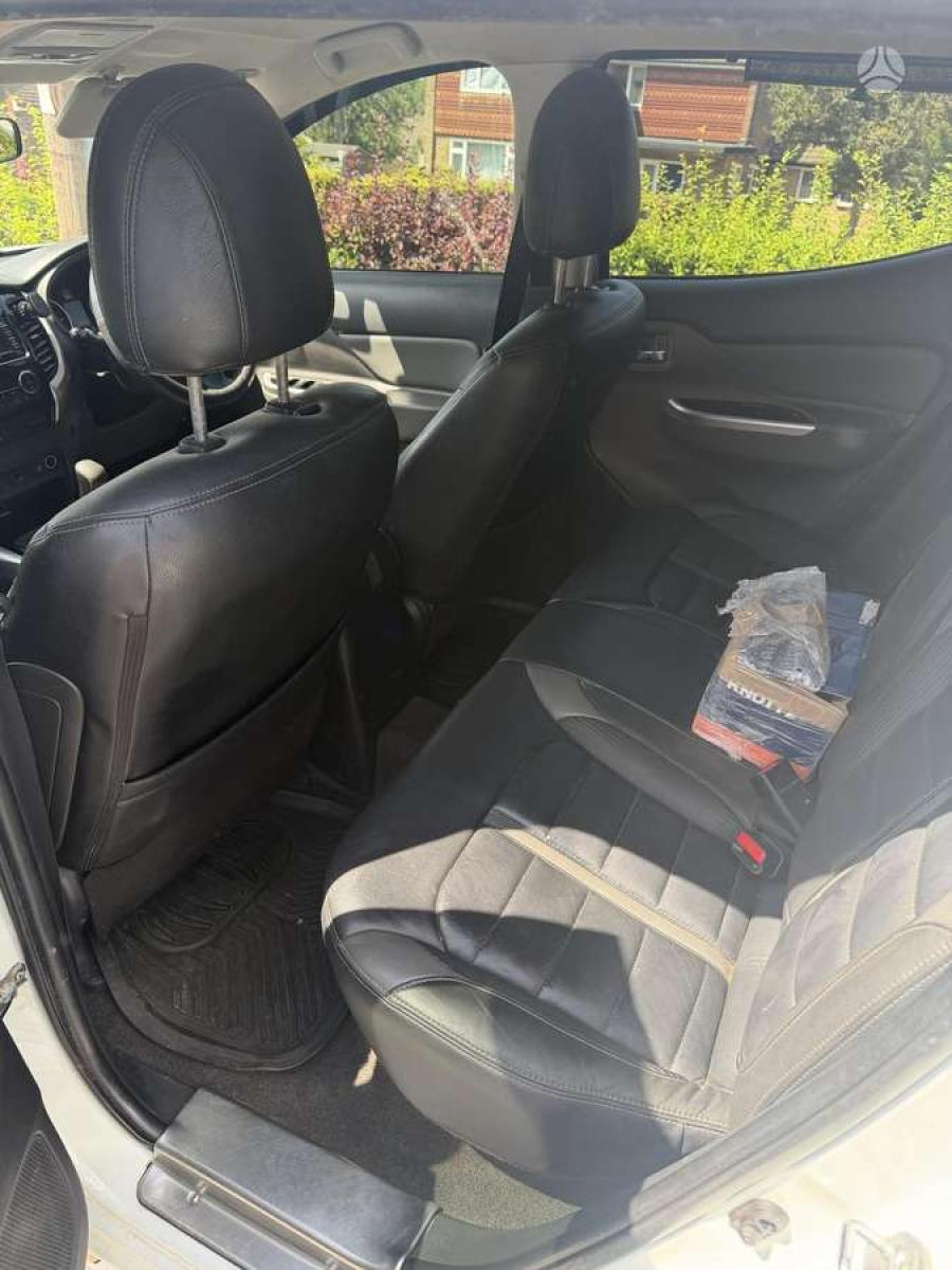 White Mitsubishi l-200 2015 in Jonava, with an engine capacity of 2.44 L and mileage of 158 thousand km for 8250 €, photo 9 on AUTOMOTO.COM.LV