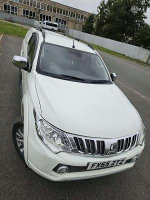 White Mitsubishi l-200 2015 in Jonava, with an engine capacity of 0.00 L and mileage of 159 thousand km for 7750 €, photo 3 on AUTOMOTO.COM.LV