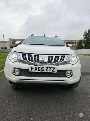 White Mitsubishi l-200 2015 in Jonava, with an engine capacity of 0.00 L and mileage of 159 thousand km for 7750 €, photo 4 on AUTOMOTO.COM.LV