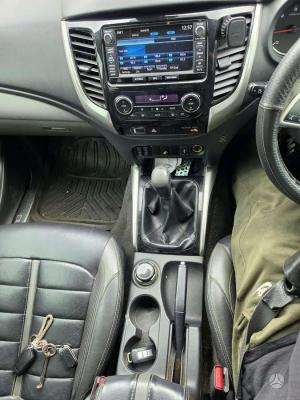 White Mitsubishi l-200 2015 in Jonava, with an engine capacity of 0.00 L and mileage of 159 thousand km for 7750 €, photo 17 on AUTOMOTO.COM.LV