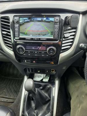 White Mitsubishi l-200 2015 in Jonava, with an engine capacity of 0.00 L and mileage of 159 thousand km for 7750 €, photo 19 on AUTOMOTO.COM.LV