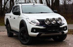 White Mitsubishi l-200 2017 in Kretinga, with an engine capacity of 2.44 L and mileage of 201 thousand km for 13999 €, photo  on AUTOMOTO.COM.LV