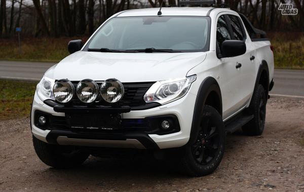 White Mitsubishi l-200 2017 in Petrikaiciai, with an engine capacity of 2.40 L and mileage of 201 thousand km for 13999 €, photo 4 on AUTOMOTO.COM.LV