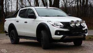 White Mitsubishi l-200 2017 in Petrikaiciai, with an engine capacity of 2.40 L and mileage of 201 thousand km for 13999 €, photo 5 on AUTOMOTO.COM.LV