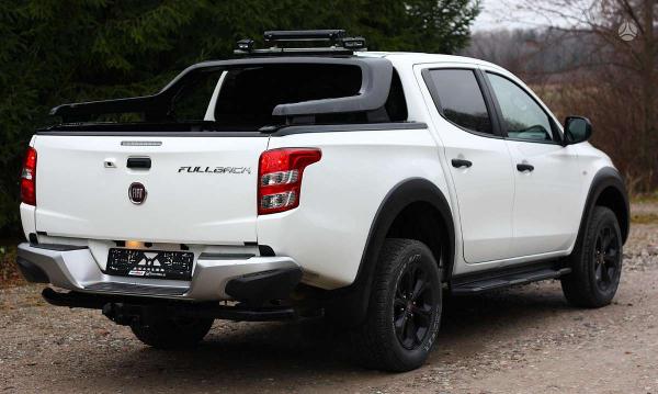 White Mitsubishi l-200 2017 in Kretinga, with an engine capacity of 2.44 L and mileage of 201 thousand km for 13999 €, photo 9 on AUTOMOTO.COM.LV