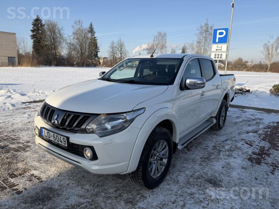 White Mitsubishi l-200 2018 in Jelgava, with an engine capacity of 2.40 L and mileage of 439 thousand km for 15500 €, photo 1 on AUTOMOTO.COM.LV